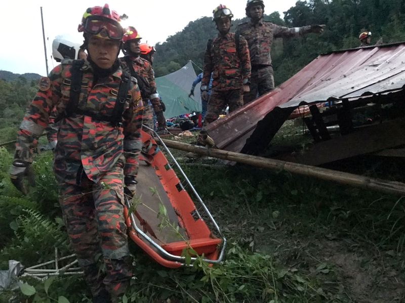 Malaysia campsite landslide kills 21, including children Malaysia campsite landslide kills 21, including children